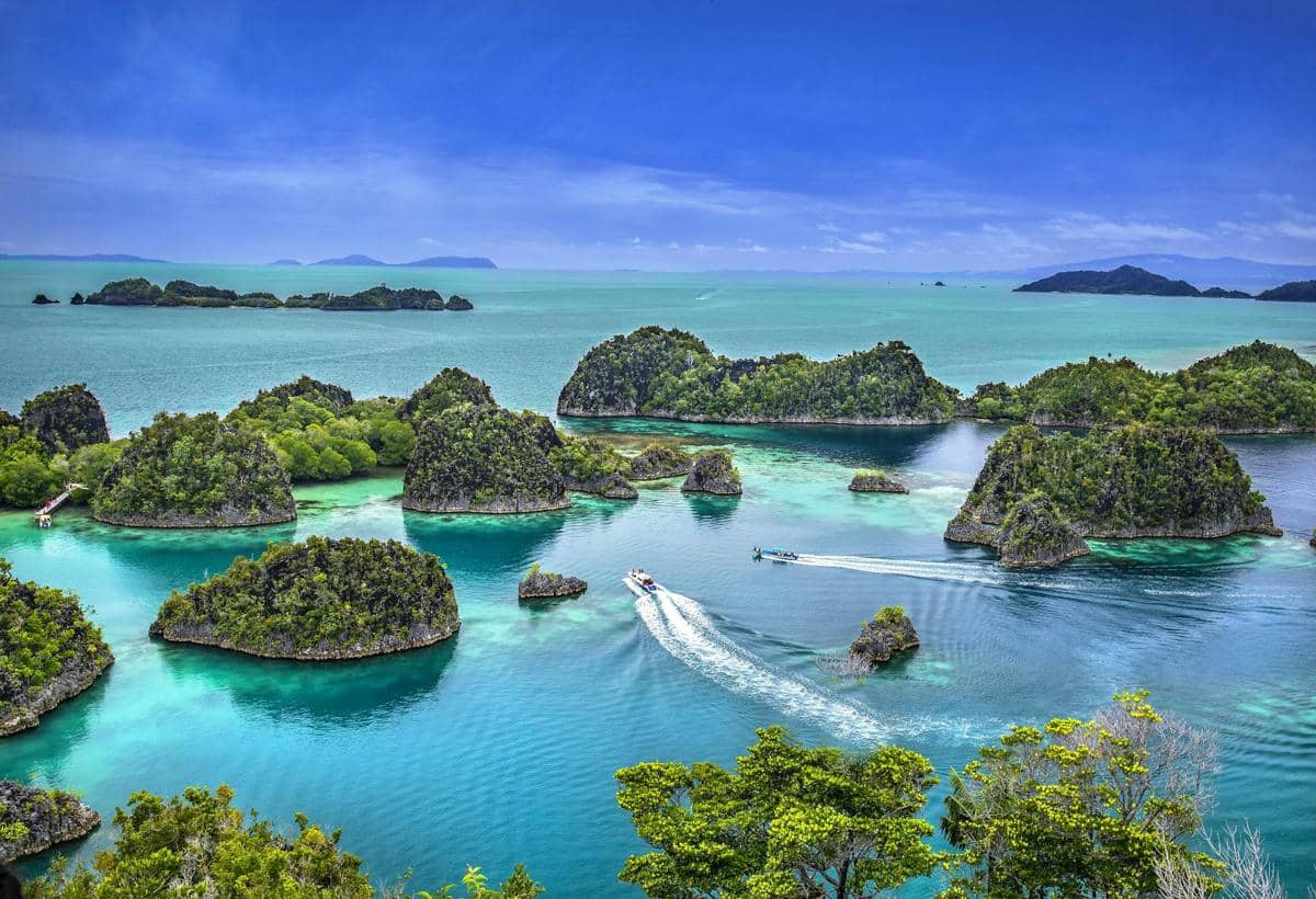 Kapan Waktu Terbaik Berkunjung ke Raja Ampat Tanpa Terganggu Cuaca ...