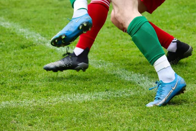 Makna Bendera Saint Kitts and Nevis di Sepatu Cole Palmer | IDN Times